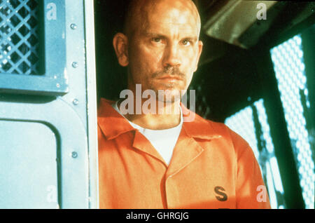 CON AIR John Malkovich as Cyrus Grissom in the 1997 film Stock Photo ...