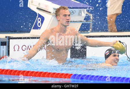 Kazakhstan's Dmitriy Balandin celebrates after winning the gold medal ...