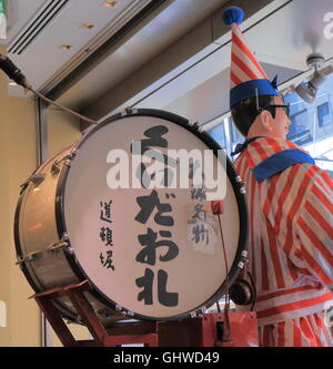 Famous Kuidaore doll in Dotonbori in Osaka Japan Stock Photo - Alamy