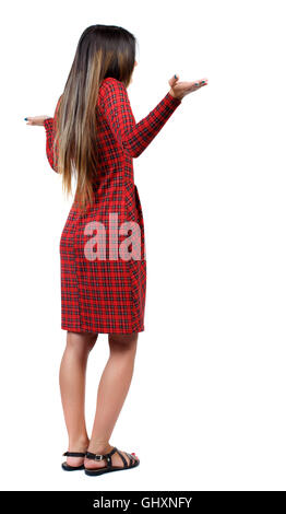 Rear view of angry business woman in audience at presentation disrupted ...