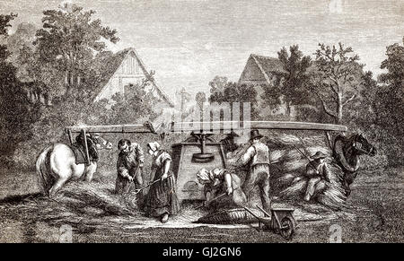 Old hand-driven Threshing machine Stock Photo - Alamy