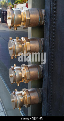 fire hose connections outside a building Stock Photo: 85826352 - Alamy