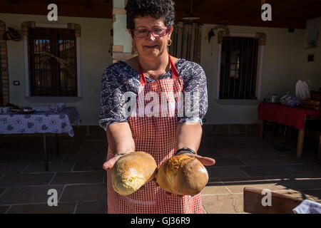 Italy, Bossico, bread-making Stock Photo - Alamy