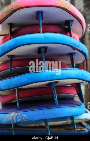 Surfboard stack at surf school Stock Photo - Alamy