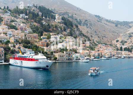Yacht in the port of Symi, Greek Island Stock Photo: 123082669 - Alamy
