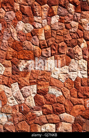 a beige color stacked stone wall texture background Stock Photo - Alamy