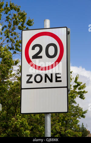 20 Miles per hour speed limit sign against a blue sky Stock Photo - Alamy