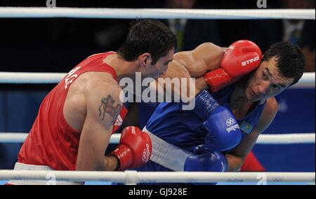 Teymur Mammadov (AZE, red) and Adilbek Niyazymbetov (KAZ). Boxing ...