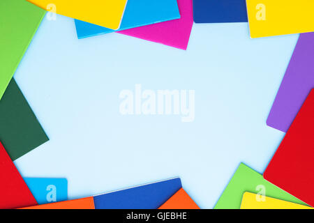 Colorful notebooks on blue background. Top view Stock Photo - Alamy