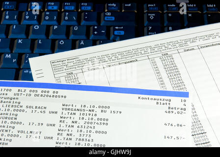 TAN list for Online Banking and bank statement on a keypad Stock Photo ...
