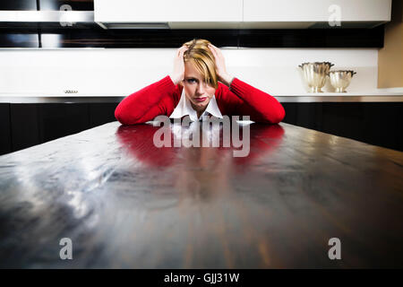 Disappointed young European woman sad about for New year preparations ...
