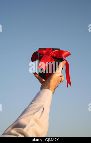 Giftbox with present tape on wrapping paper holidays concept Stock ...