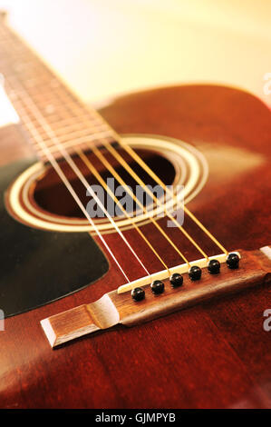 Details of a classic wooden guitar with strings Stock Photo - Alamy