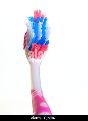 Used worn blue toothbrush close up isolated on white background ...