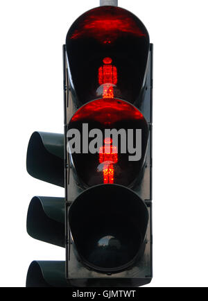 A bright red traffic light is hanging down from a tall pole, clearly ...
