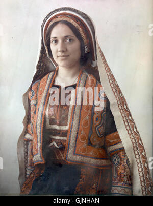 This image features a woman from Ramallah, captured in a moment of ...