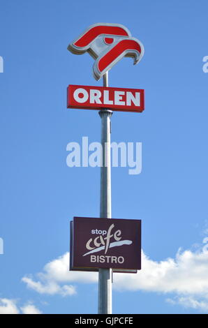 sign of Orlen against blue sky Stock Photo - Alamy