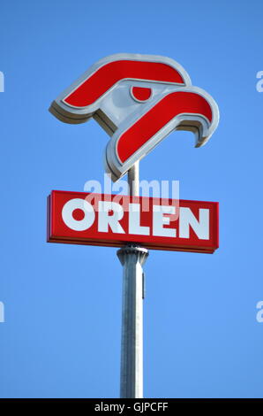 sign of Orlen against blue sky Stock Photo - Alamy