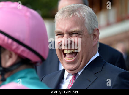 The Duke of York laughs as he visits the parade ring during day one of ...