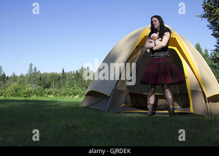 Goth girl camping Stock Photo - Alamy