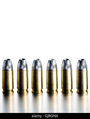 Close-up of a group of 9mm rounds. Cartridge background. New cartridges ...