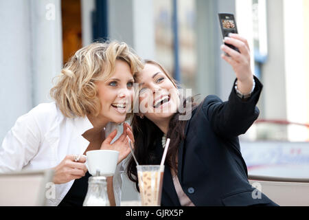 Photo of funny young brunette lady show size wear yellow shirt isolated ...