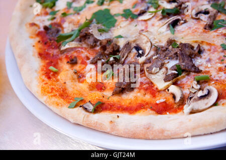 Pizza with peppers, anchovies and cheese Stock Photo - Alamy
