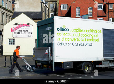 Olleco van delivering cooking oil from fish & chip shop, and taking ...
