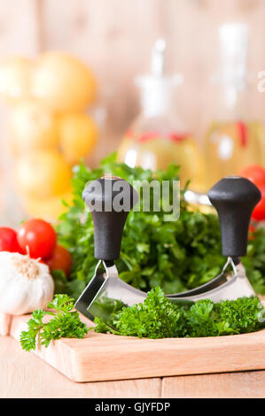 Fresh lemons, sea salt and herbs on dark slate background Stock Photo ...