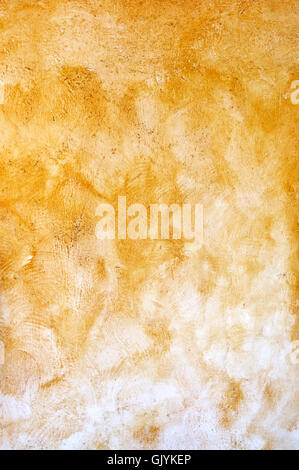 A detailed view of a textured beige concrete surface, showcasing ...