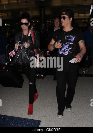 Slash and a female companion at Los Angeles International Airport (LAX ...