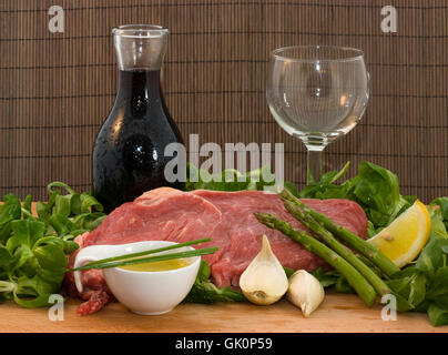 a ready to cook food composition with rack of lambs and other ...
