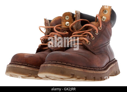 Old work boots shoes leather worn boots Stock Photo - Alamy