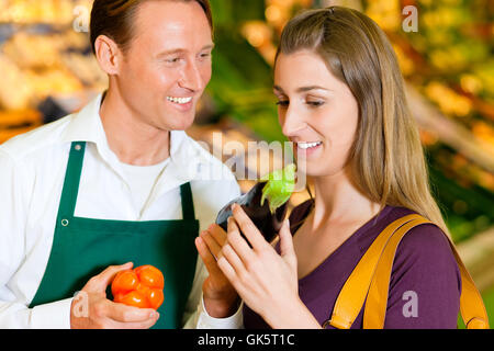 supermarket salesman salesperson shops woman customer retail shop shop ...