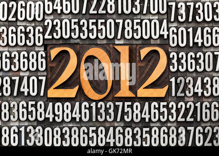 background of random vintage letterpress metal type printing blocks ...