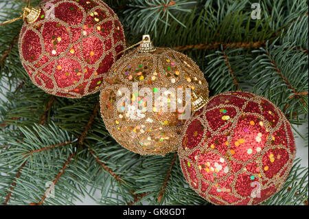 Christmas toys on branches of a fur-tree Stock Photo - Alamy