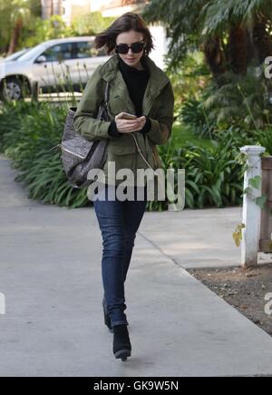 Lily Collins arrives at a friends house in Beverly Hills Featuring ...