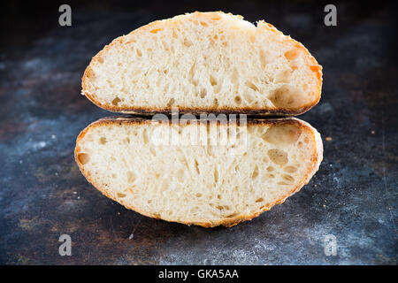 Fresh Homemade Rustic Bread Loaf On Dark Table With Flour Dust Stock ...