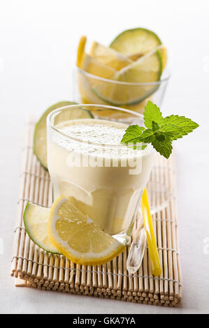 Creamy lemon fruit smoothie, yogurt ar milkshake, Sour sweet drink with ...