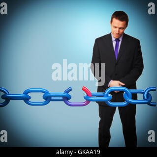 Business man with broken chain Stock Photo - Alamy