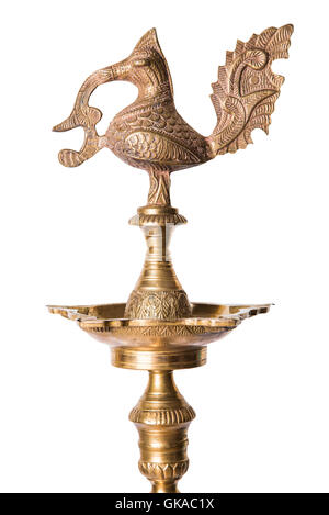 Golden samai oil lamp with bird Stock Photo - Alamy