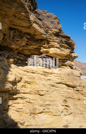 Cliffs of yellow coloured Magnesian Limestone rock at Seaham Beach ...