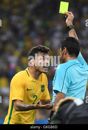 referee Alireza Faghani shows a yellow card to Inter Miami's Tomas ...