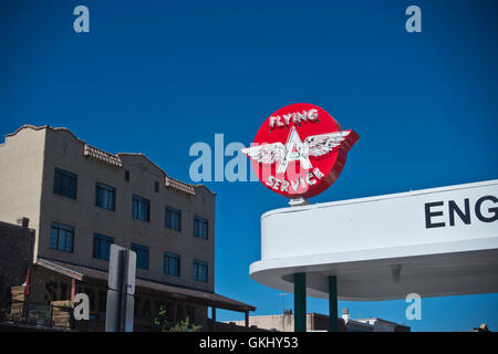 Flying A service station gasoline sign with wings at sunrise sunset in ...