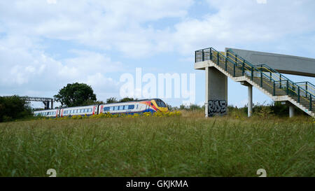 Fast inter city train through countryside Stock Photo - Alamy