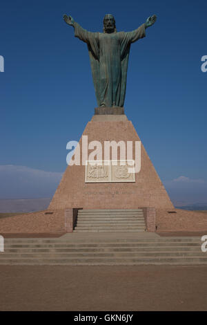 Statue of Christ on the top of the Morro de Arica, a cliff that towers ...