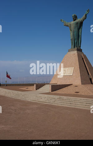 Statue of Christ on the top of the Morro de Arica, a cliff that towers ...