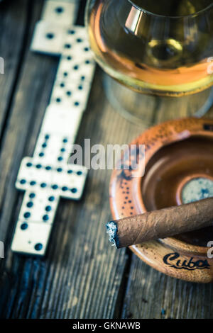 cuban traditional domino game, cigar and cognac Stock Photo - Alamy