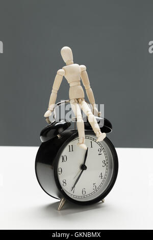 Puppet and alarm clock Stock Photo - Alamy