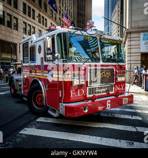 FDNY Ladder 6 from Chinatown turns a sharp corner in the Financial ...